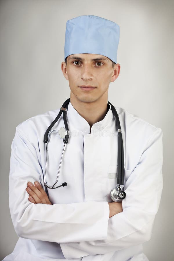 Young Doctor with Stereoscope Stock Photo - Image of friendly, gesture ...