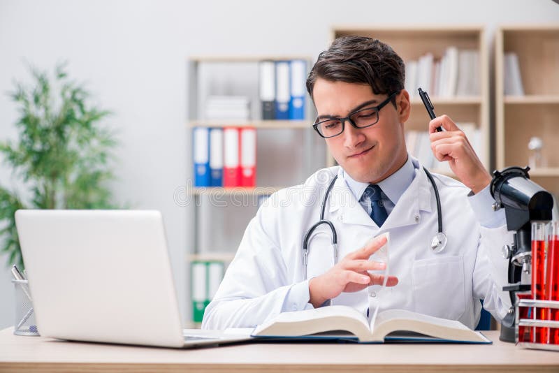 The Young Doctor Studying Medical Education Stock Image - Image of ...