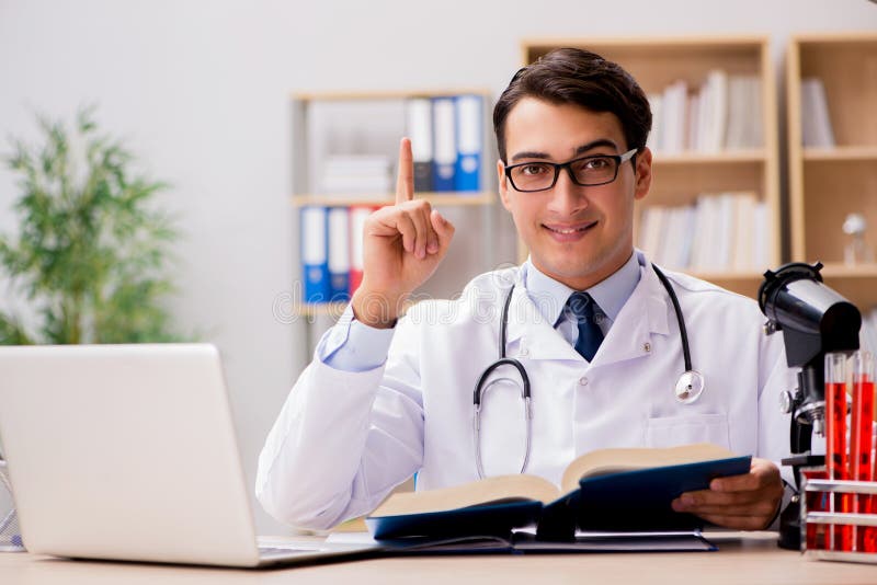 The Young Doctor Studying Medical Education Stock Image - Image of male ...