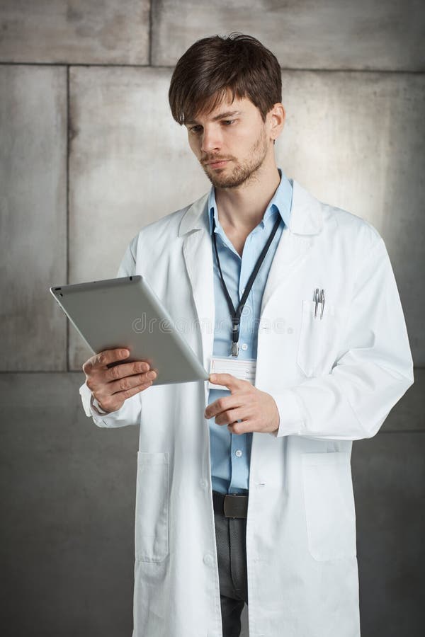 Young Doctor with Tablet Pc Stock Image - Image of focusing, american ...