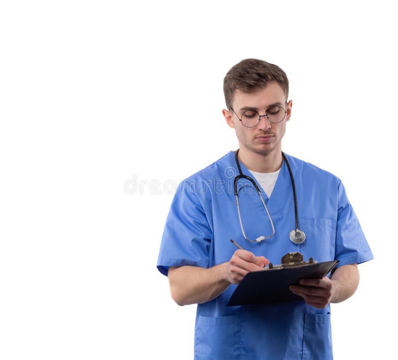 Young Doctor in Uniform and with a Stethoscope Writes Annotations in a ...