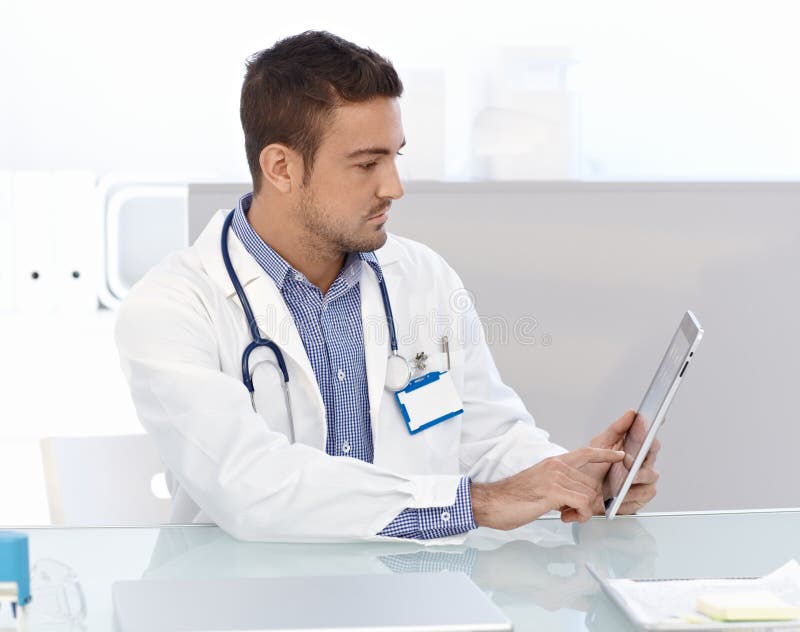 Doctor using computer stock photo. Image of horizontal - 7674694
