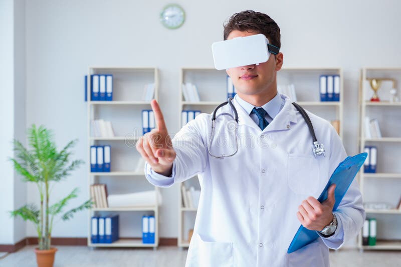 Young Doctor with Vr Virtual Reality Headset Working in the Offi Stock ...