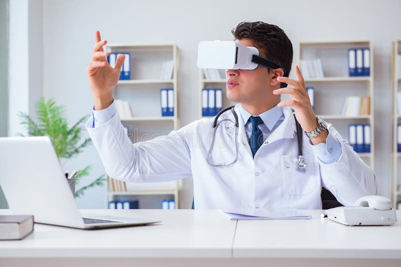 Young Doctor with Vr Virtual Reality Headset Working in the Offi Stock ...