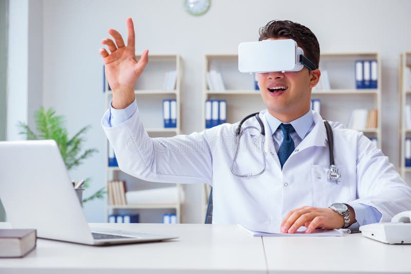 Young Doctor with Vr Virtual Reality Headset Working in the Offi Stock ...