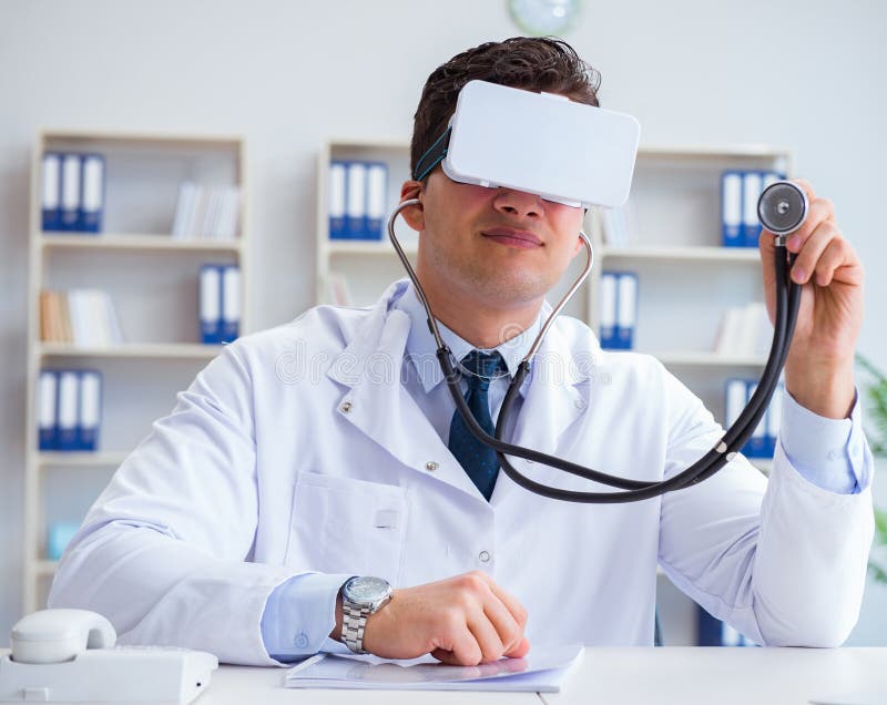Young Doctor with Vr Virtual Reality Headset Working in the Offi Stock ...