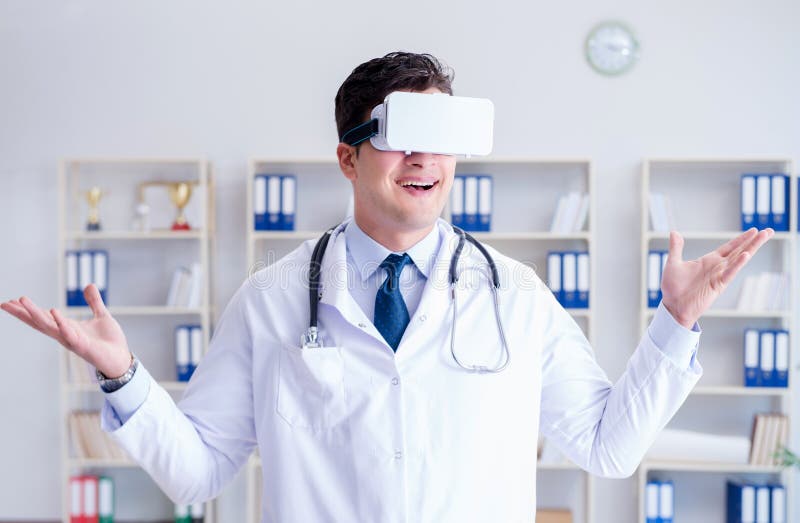 Young Doctor with Vr Virtual Reality Headset Working in the Offi Stock ...