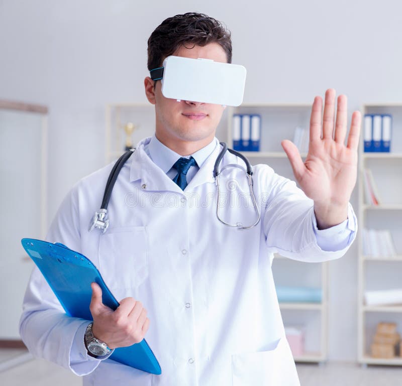 Young Doctor with Vr Virtual Reality Headset Working in the Offi Stock ...