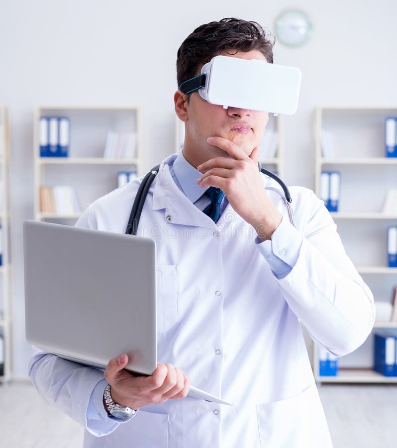 Young Doctor with Vr Virtual Reality Headset Working in the Offi Stock ...