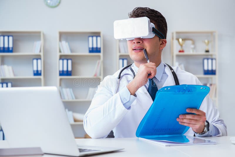 Young Doctor with Vr Virtual Reality Headset Working in the Offi Stock ...