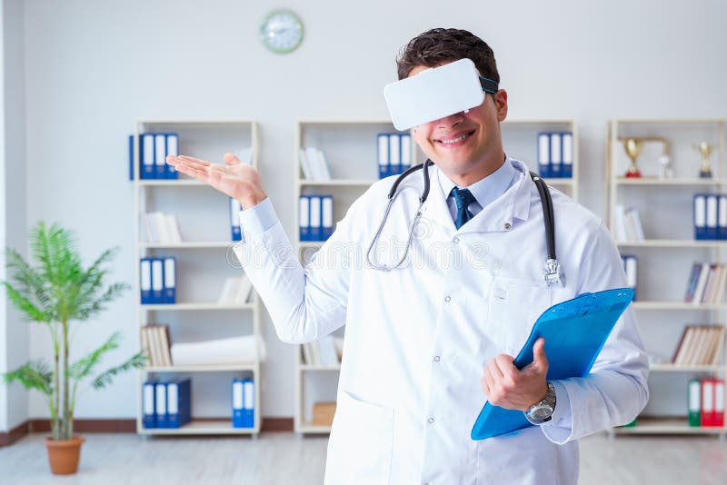 Young Doctor with Vr Virtual Reality Headset Working in the Offi Stock ...