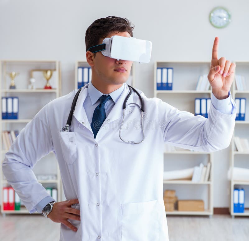Young Doctor with Vr Virtual Reality Headset Working in the Offi Stock ...