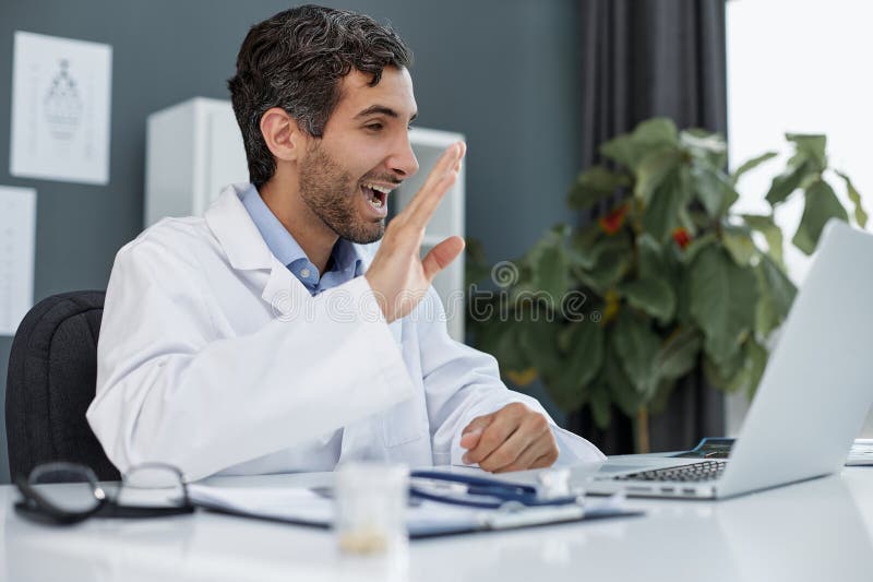 Doctor Explaining through Video Call in Clinic Stock Image - Image of ...
