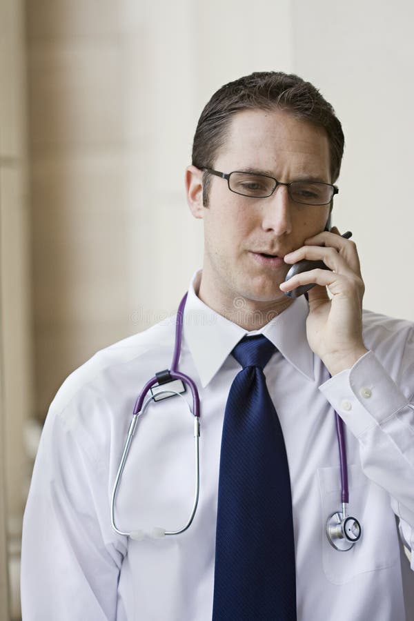 Young Doctor working stock image. Image of confident, patient - 4429387