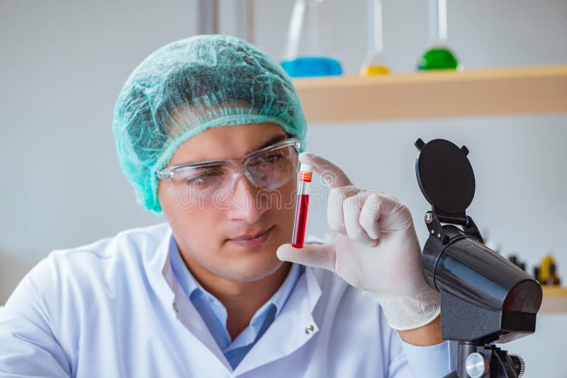 The Young Doctor Working on Blood Test in Lab Hospital Stock Image ...