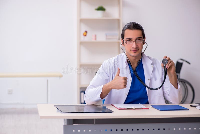 Young Doctor Working in the Hospital Stock Photo - Image of practice ...