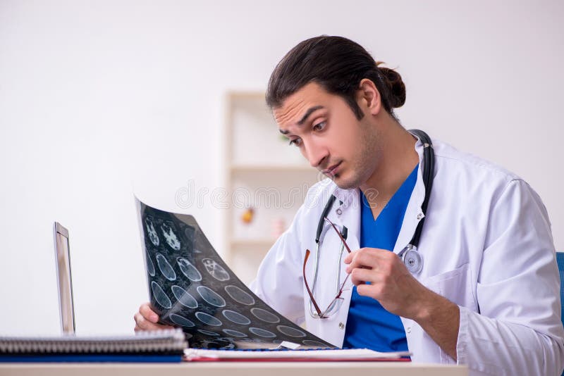 Young Doctor Working in the Hospital Stock Photo - Image of physician ...