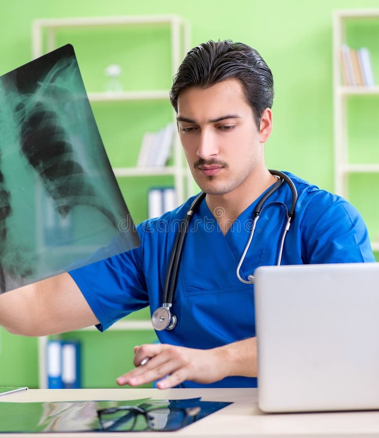 Young Doctor Working in the Hospital Stock Photo - Image of lung ...