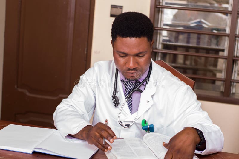 Group Of Doctors With Tablet Computers Meeting In Medical Office Stock ...