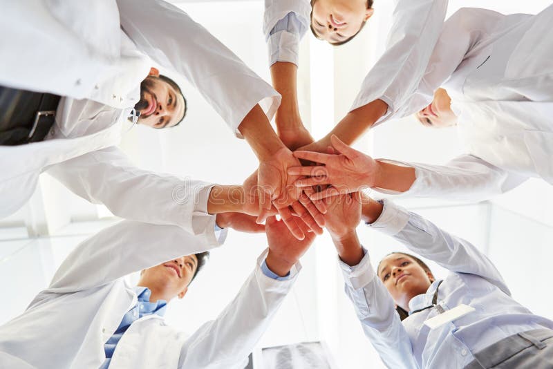Young Doctors As Team Stack Hands Together Stock Photo - Image of ...