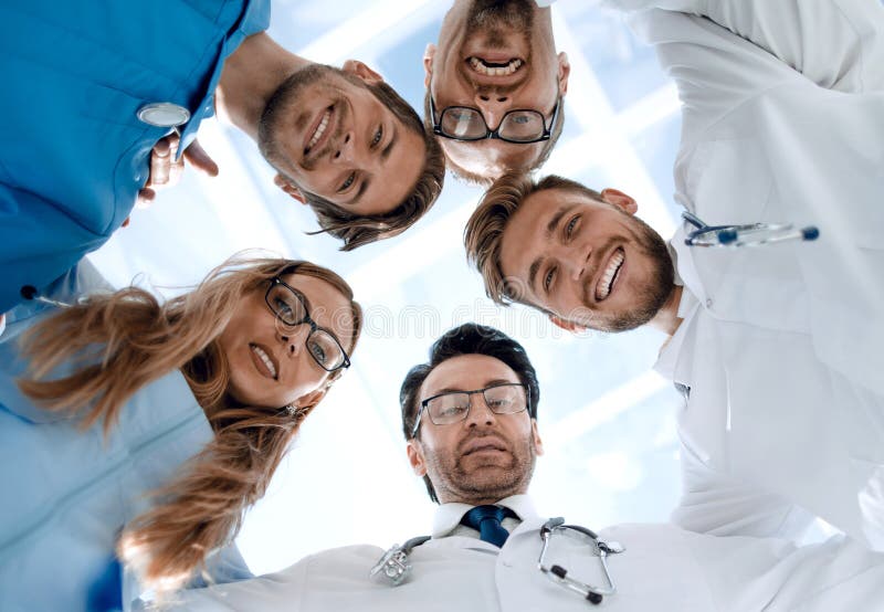 Doctors Looking Down Smiling at the Camera Stock Image - Image of ...