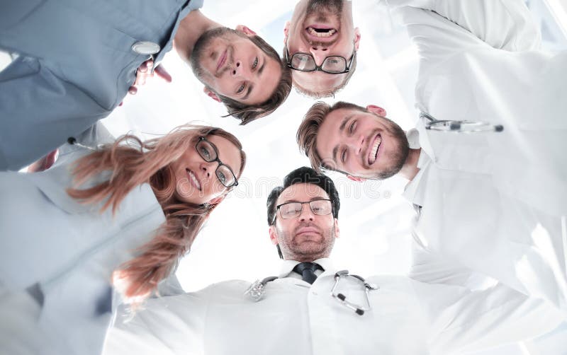 Doctors Looking Down Smiling at the Camera Stock Image - Image of ...