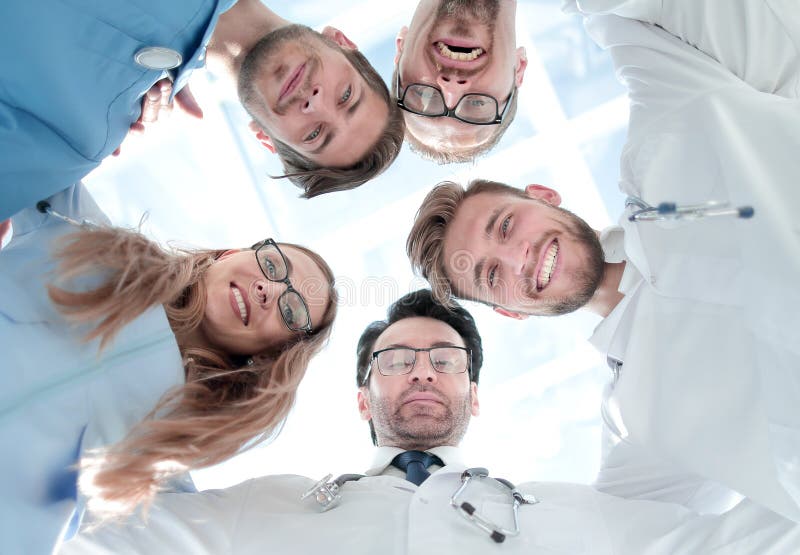 Doctors Looking Down Smiling at the Camera Stock Image - Image of ...