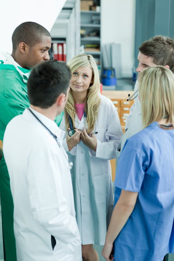 Young Doctors Discussing in the Hospital Stock Photo - Image of nurse ...