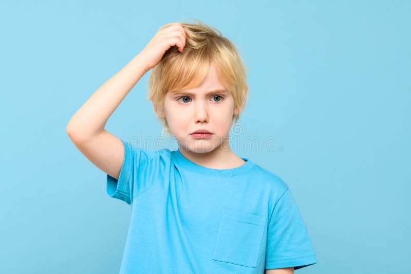 Young Doubtful Confused Boy Thinking, Scratching Head, Trying To Find ...