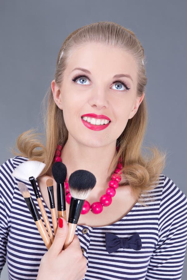 Young Dreaming Pinup Woman with Make Up Brushes Stock Photo - Image of ...