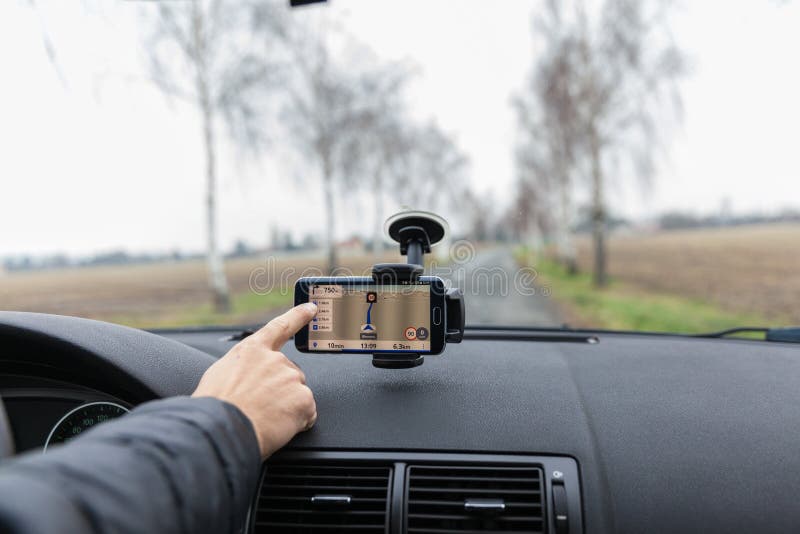 The Driver in the Car Sets the Navigation Stock Image - Image of ...