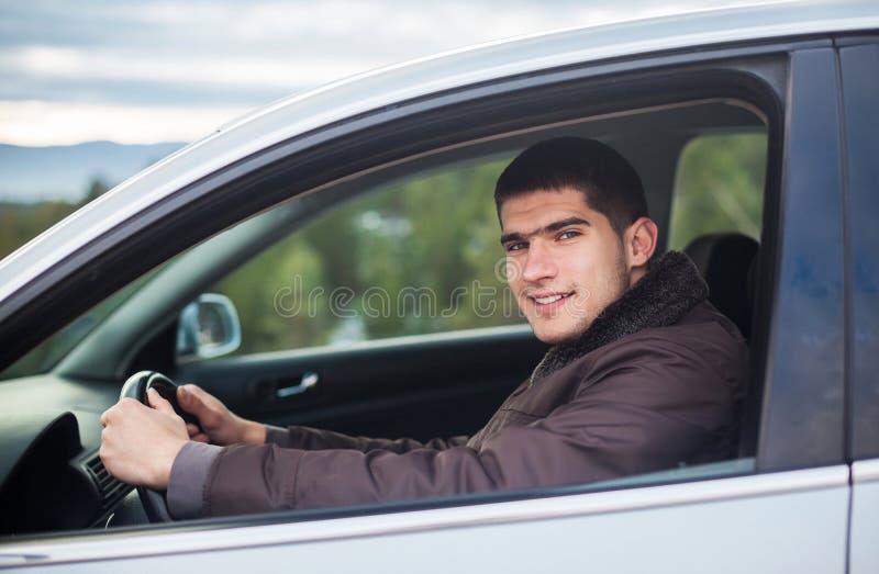 Young Driver Sitting in a Car Stock Photo - Image of selective, proud ...