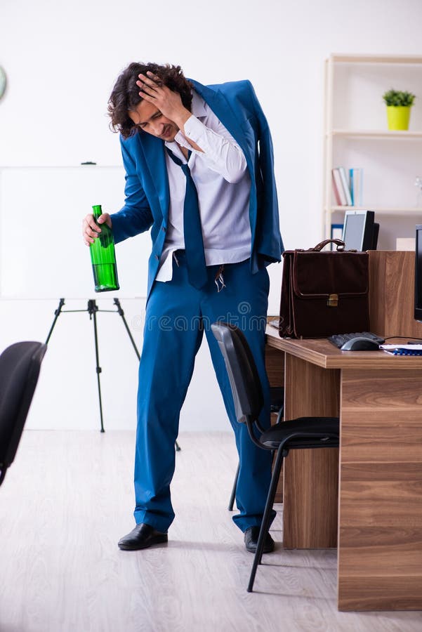 Young Drunk Employee in the Office Stock Photo - Image of bottle ...