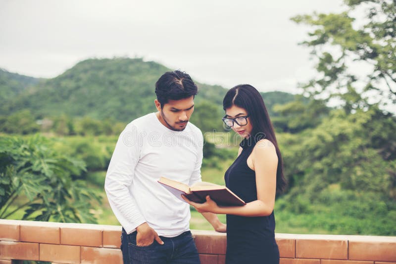 Young Education Practice Together Hand Typing on Laptop and Reading ...