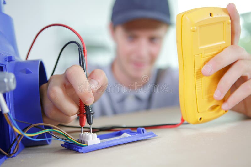 Young Electrician Testing Flow Stock Photo - Image of electricity ...