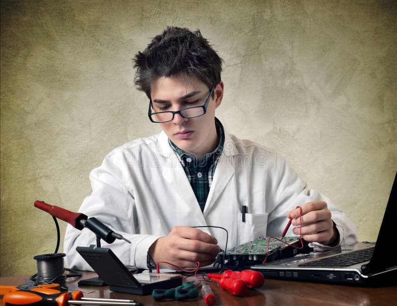Young Electronic Technician Stock Photo - Image of hardware, laptop ...