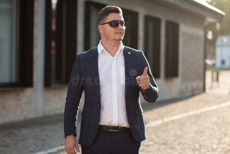 Young Elegant Businessman Walking Home from the Office Stock Image ...