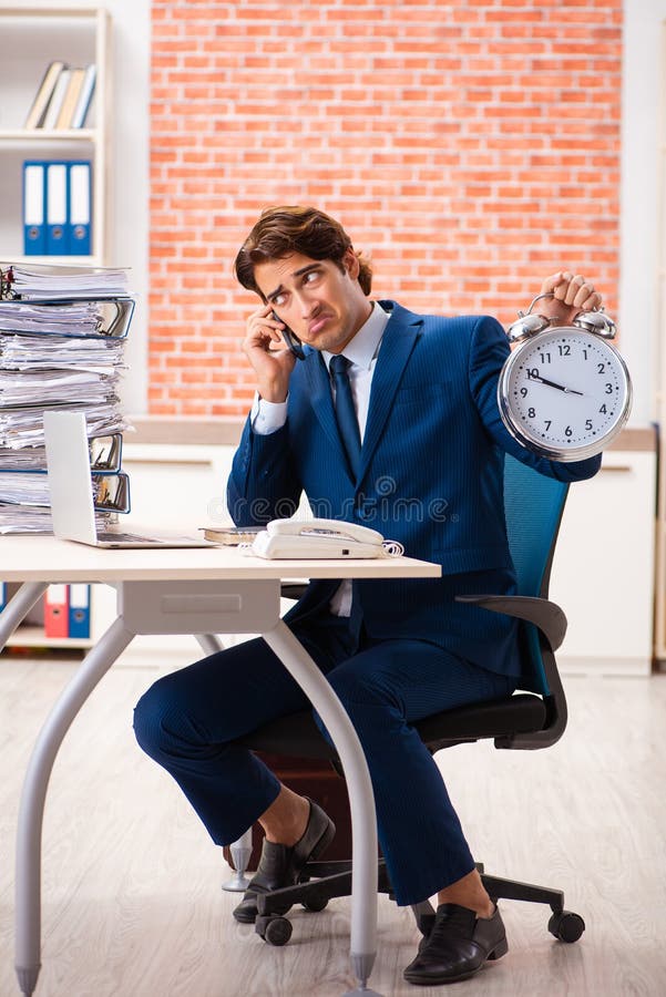 The Young Elegant Man Unhappy with Too Much Work Stock Photo - Image of ...
