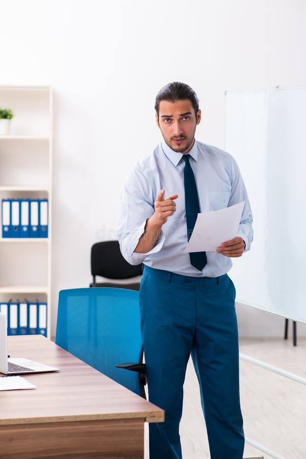 Young Male Employee in Business Presentation Concept Stock Image ...