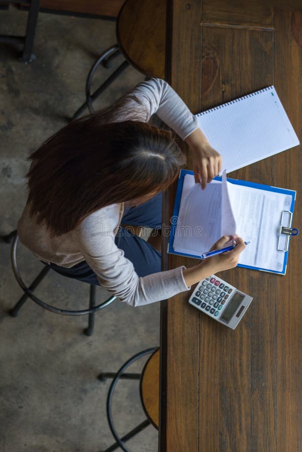 Young Employee Carefully Checking Sales Reports Stock Image - Image of ...