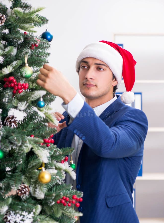 Young Employee Celebrating Christmas at Workplace Stock Photo - Image ...