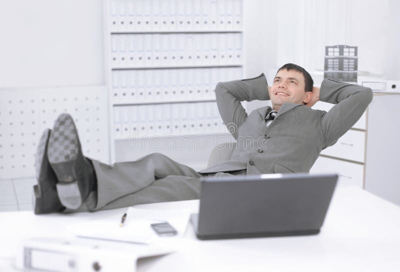 Young Employee of a Company Resting on a Workplace Stock Photo - Image ...