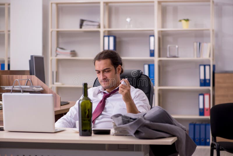 Young Male Employee Drinking Alcohol in the Office Stock Image - Image ...