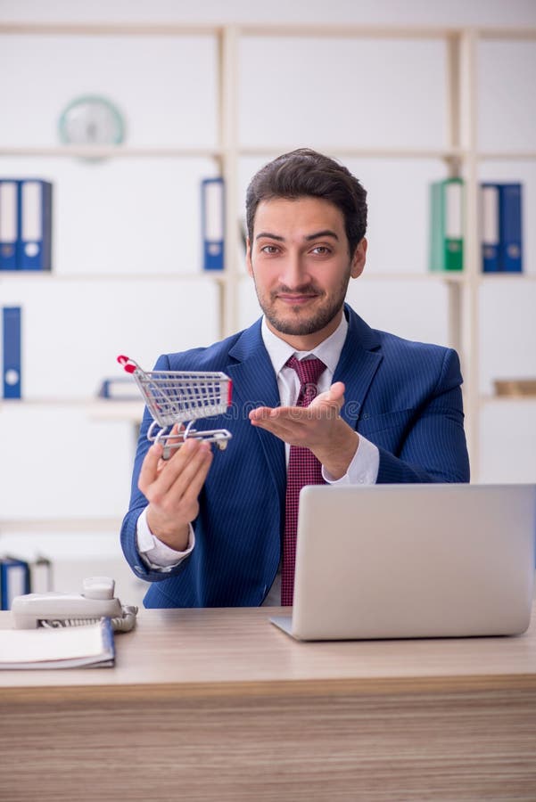 Young Male Employee in E-commerce Concept Stock Photo - Image of ...