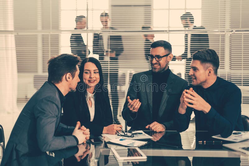 Young Employee Explaining His Ideas To Colleagues. Stock Image - Image ...