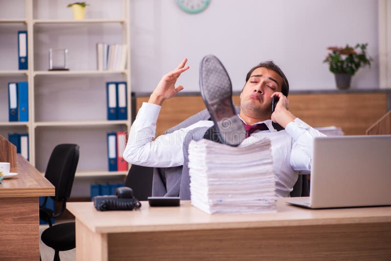 Young Male Employee Extremely Tired with Excessive Work Stock Photo ...