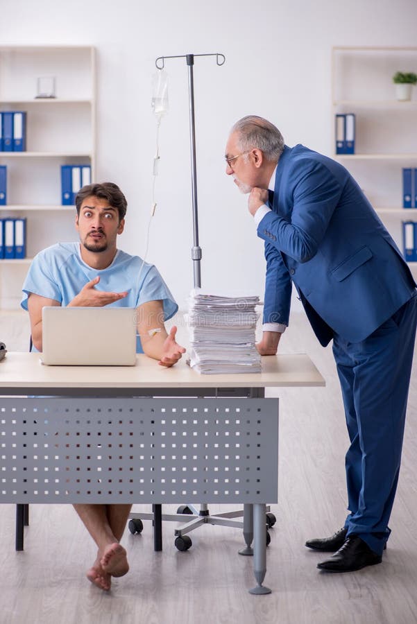 Young Male Employee Feeling Bad at Workplace Stock Photo - Image of ...