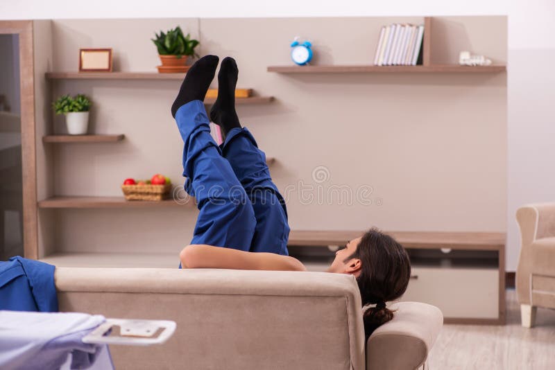 Young Male Employee Getting Up Late at Home Stock Photo - Image of ...