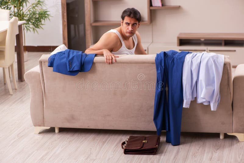 Young Male Employee Getting Up Late at Home Stock Photo - Image of ...