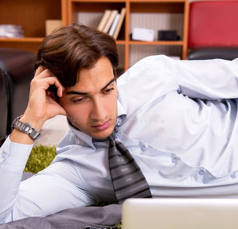 Young Employee Lying on the Floor at Office Stock Image - Image of boss ...